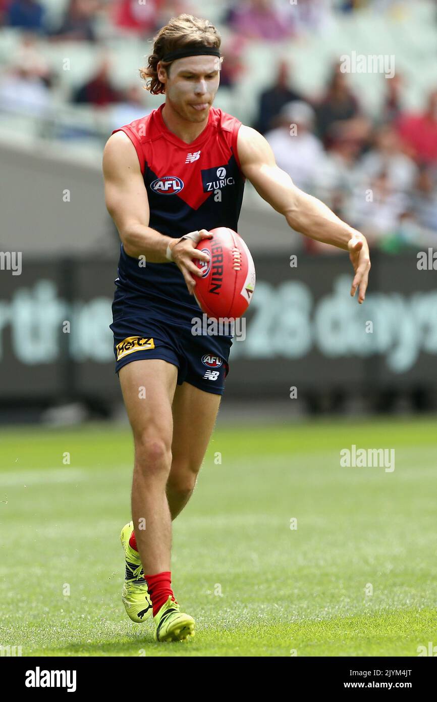 Ed Langdon of the Demons kicks the ball during the Round 1 AFL match ...