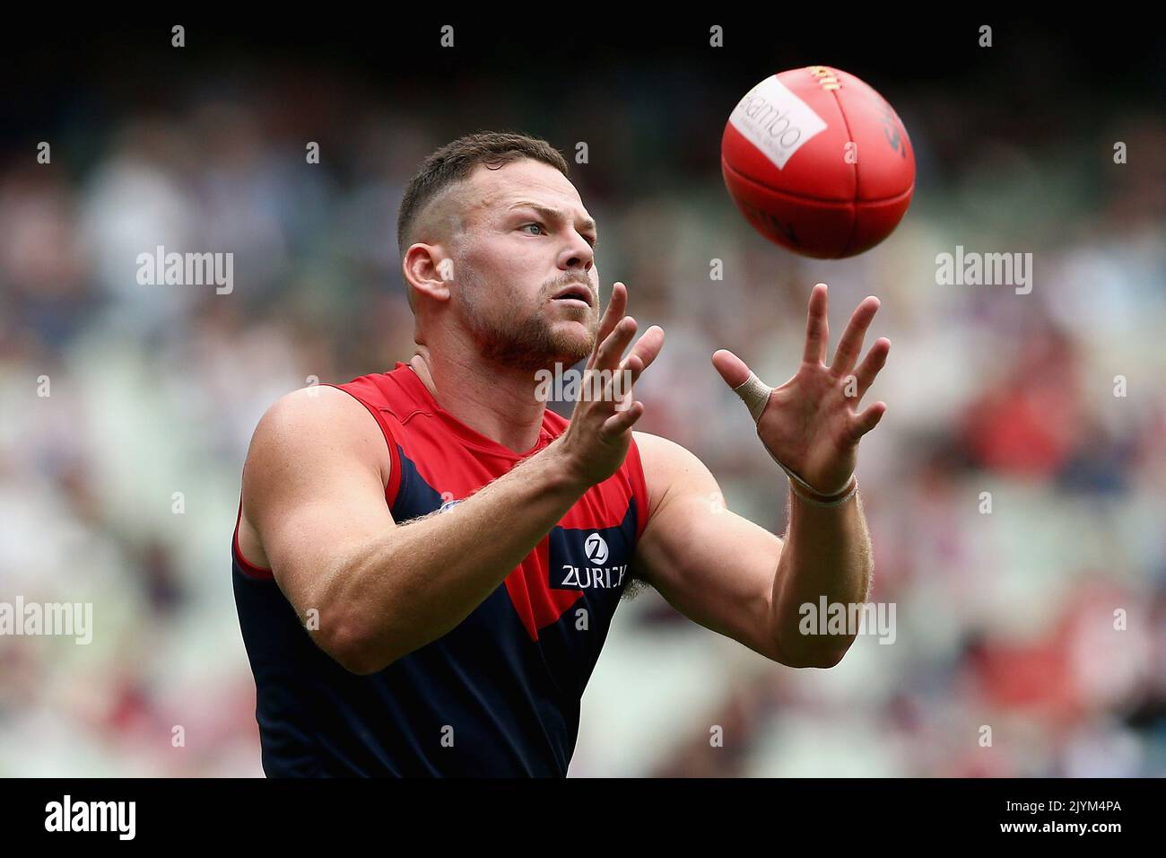 Steven May of the Demons takes a mark during the Round 1 AFL match ...