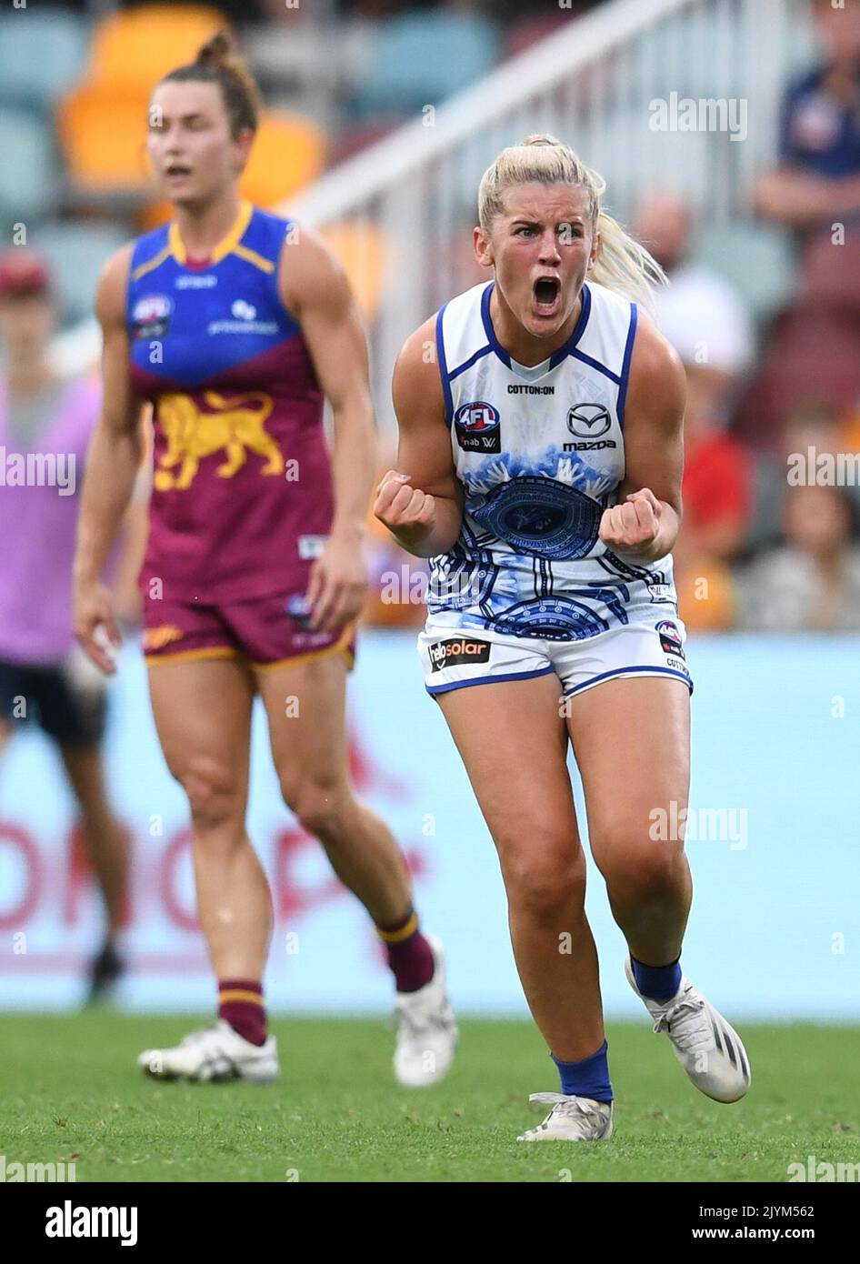Daisy Bateman of the Kangaroos celebrates kicking a goal during the ...