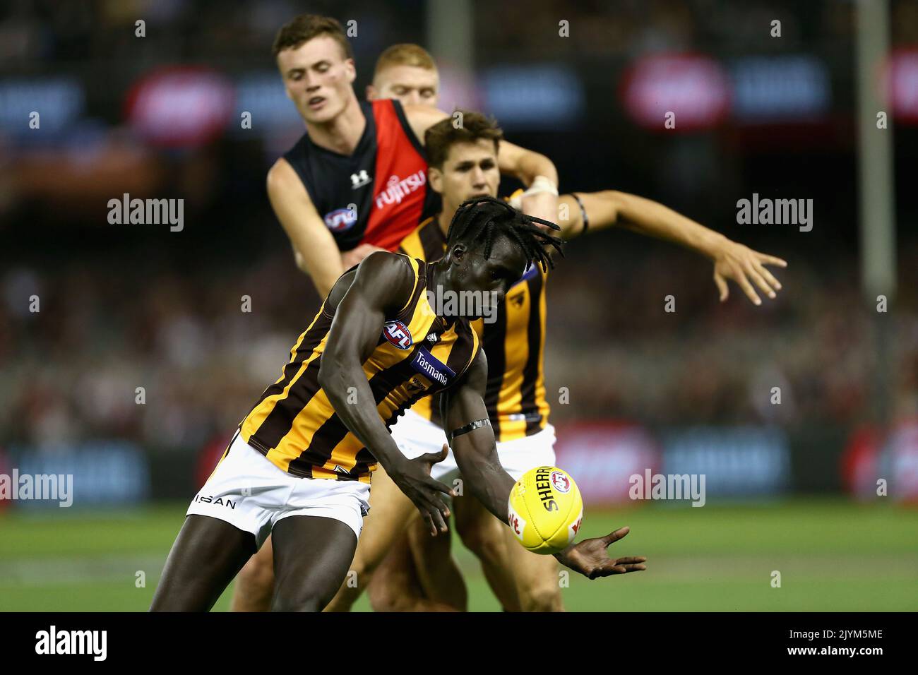 Changkuoth Jiath of the Hawks attempts a mark during the Round 1 AFL ...