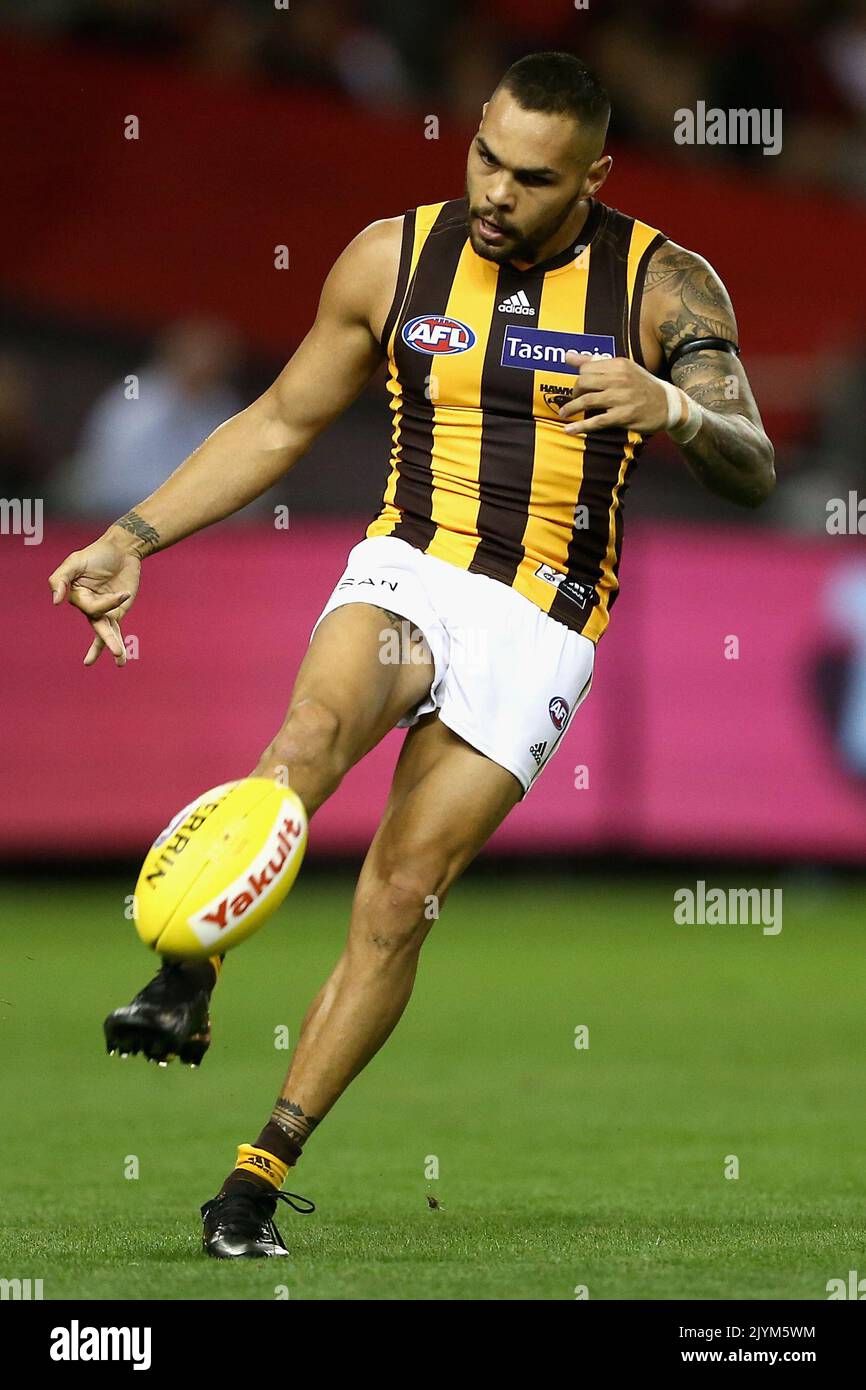 Jarman Impey of the Hawks kicks the ball during the Round 1 AFL match ...