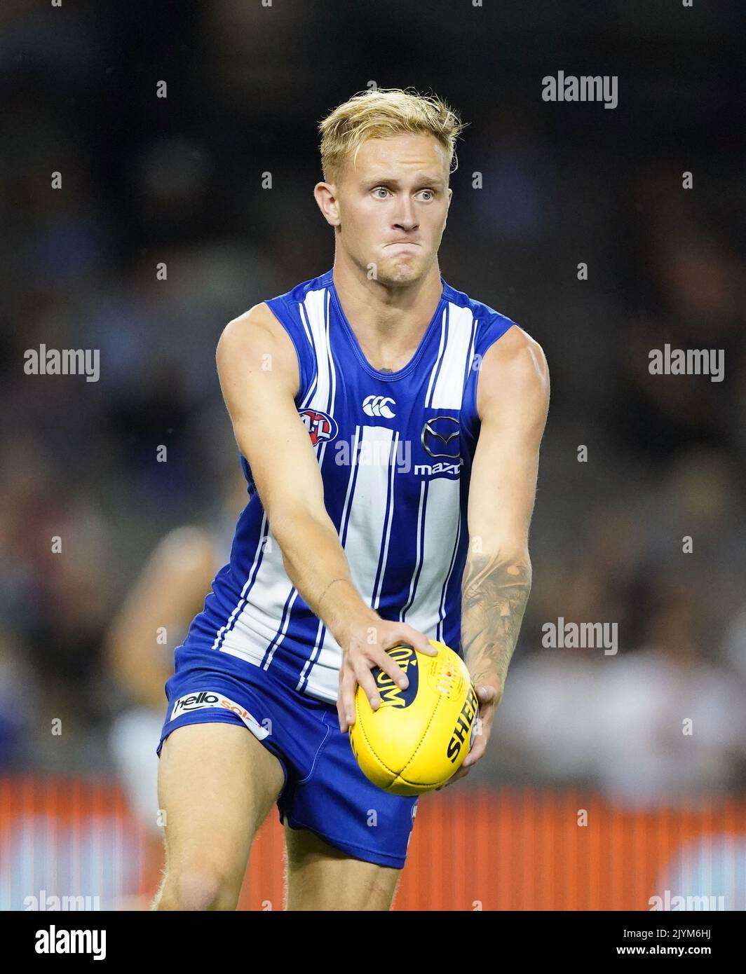 Jaidyn Stephenson of the Kangaroos runs with the ball during the Round ...