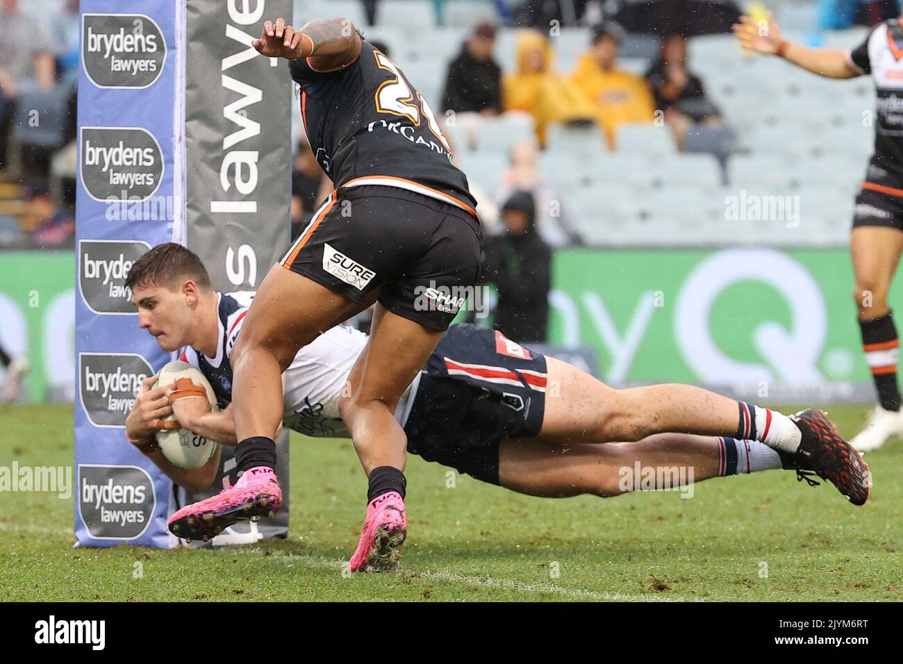 Roosters Fletcher Baker scores a try during the Round 2 NRL match ...
