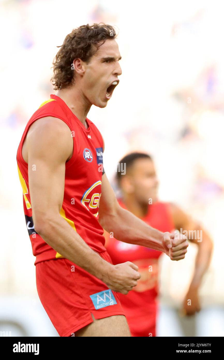 Ben King of the Suns celebrates after kicking a goal during the Round 1 ...