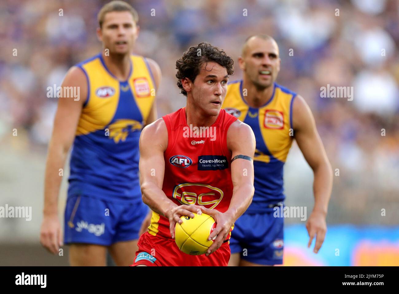 Wil Powell of the Suns in action during the Round 1 AFL match between ...