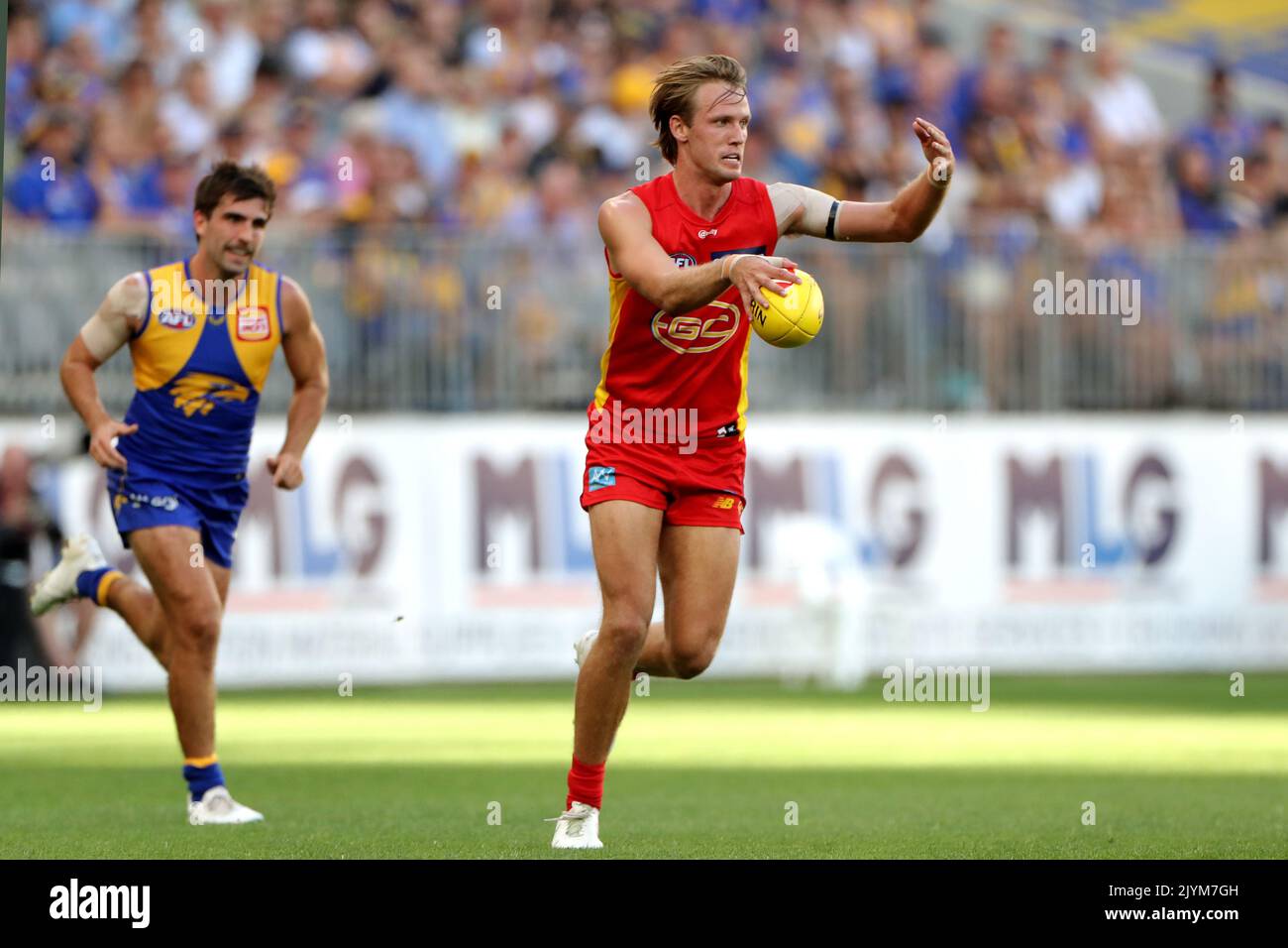 Jack Lukosius of the Suns in action during the Round 1 AFL match ...