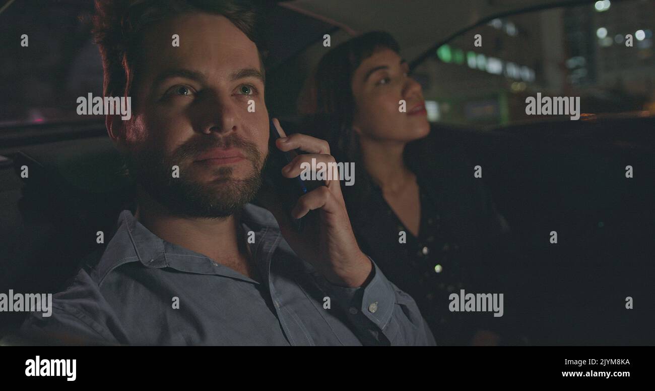 Couple taxi evening hi-res stock photography and images - Alamy