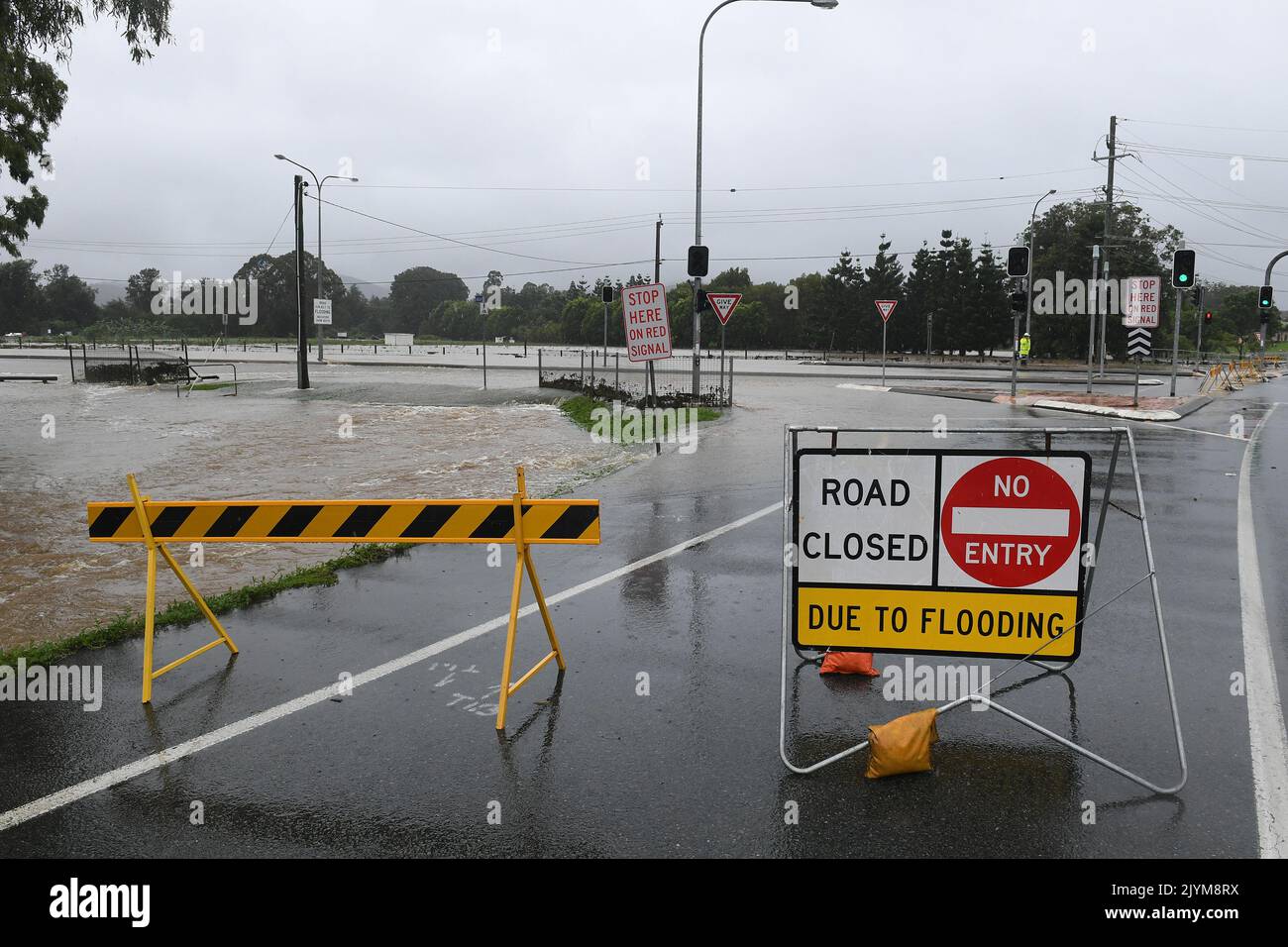 Roads are closed due to flash-flooding at Mudgeeraba on the Gold Coast ...
