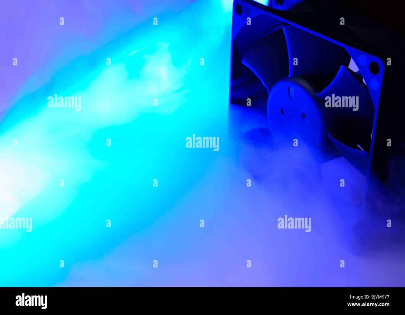Computer air cooler in a neon blue smoke - close up photo. Background ...
