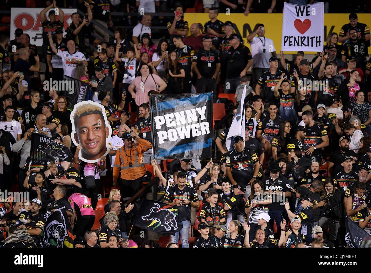 Spectators are seen in the crowd during the Round 3 NRL match between ...