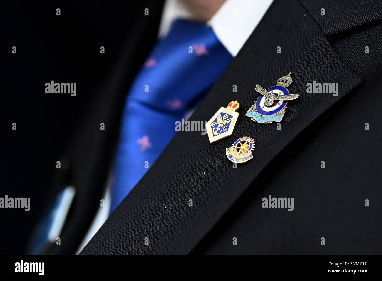 Royal Australian Air Force (RAAF) pins are seen during a commemoration ...