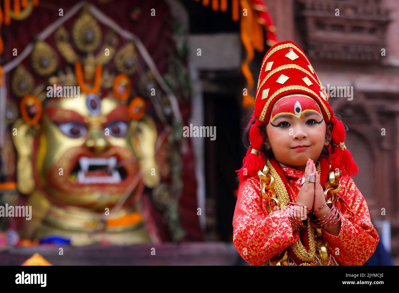 Children dressed as living goddess "Kumari" poses for a photos while ...