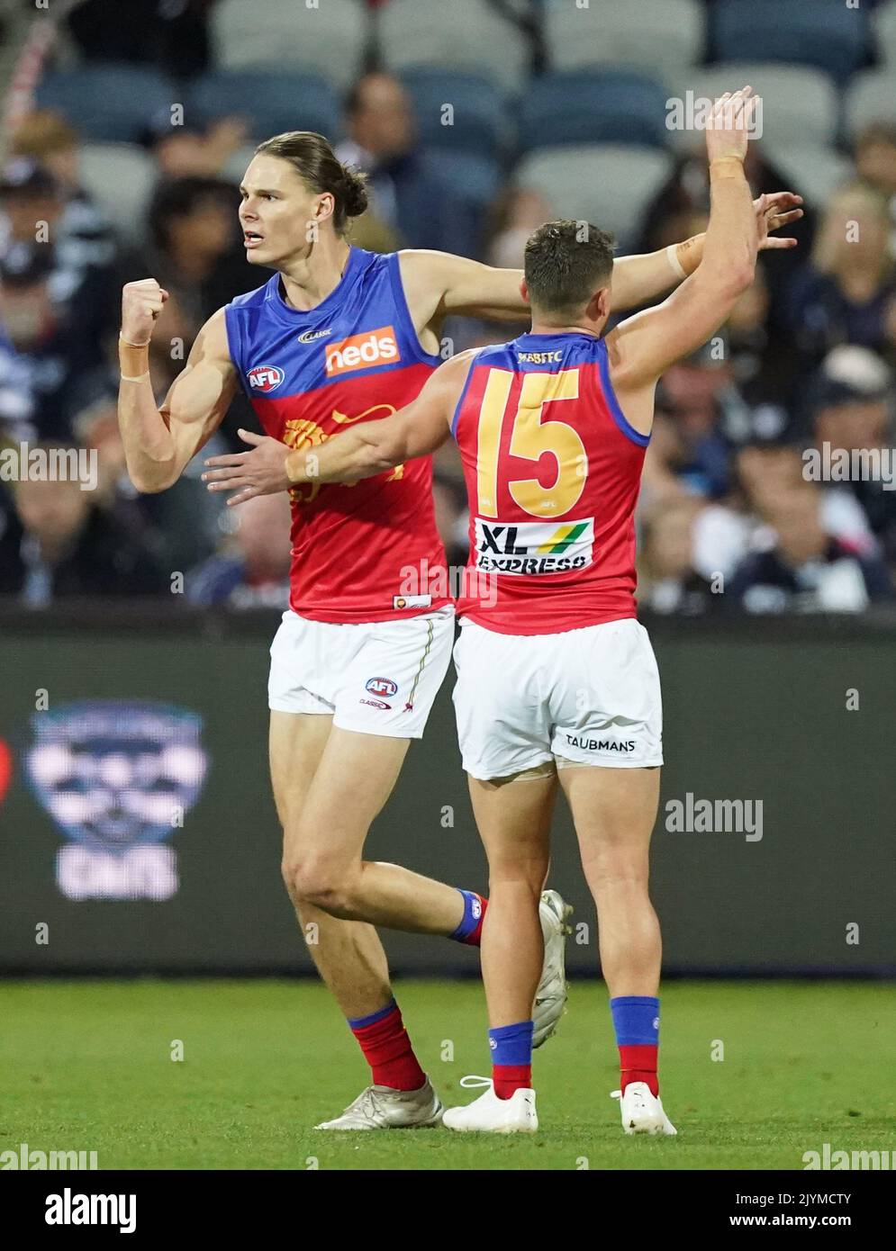 Eric Hipwood of the Lions celebrates after kicking a goal during the ...