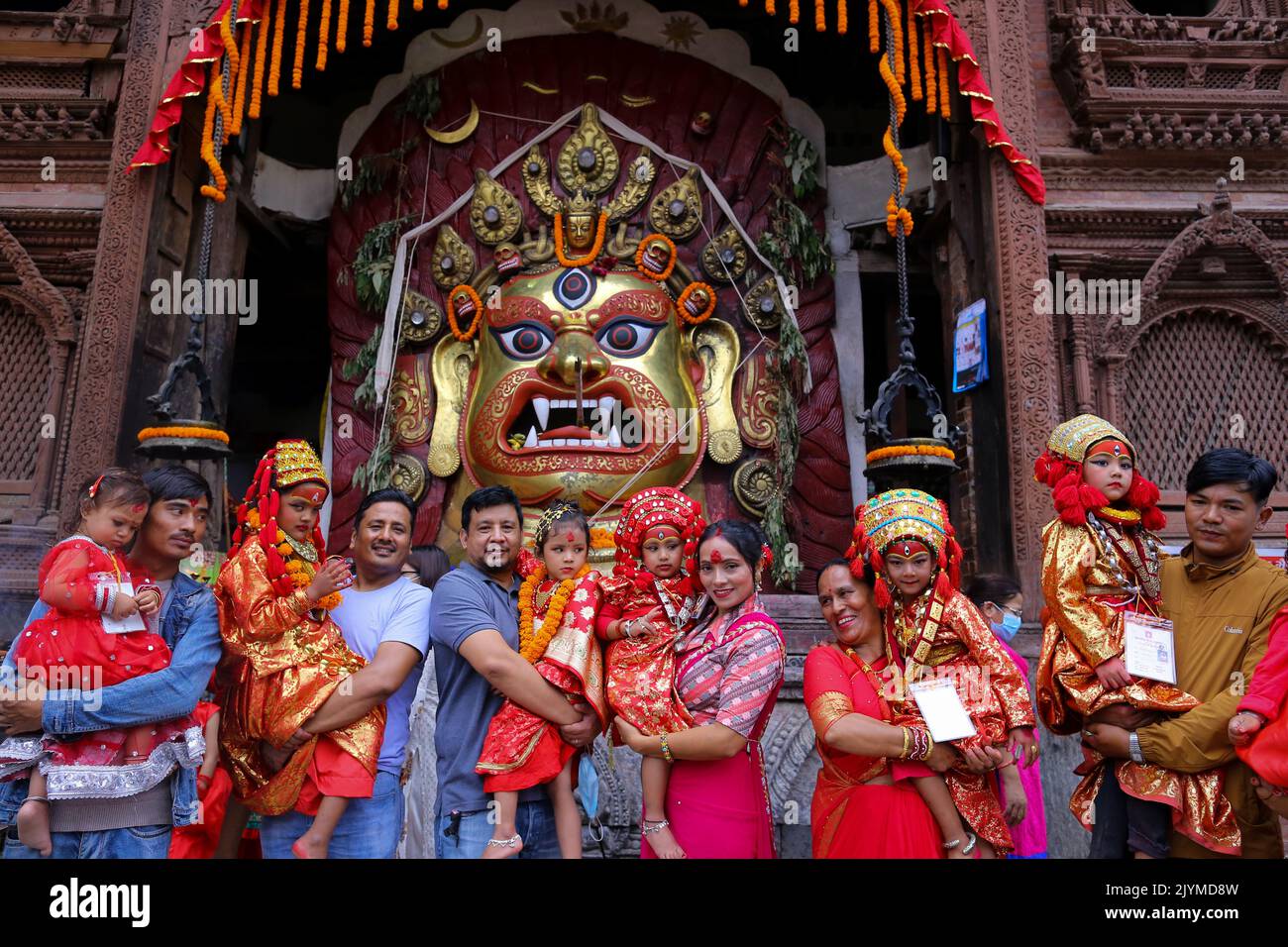 Children dressed as living goddess "Kumari" pose for photos with their ...