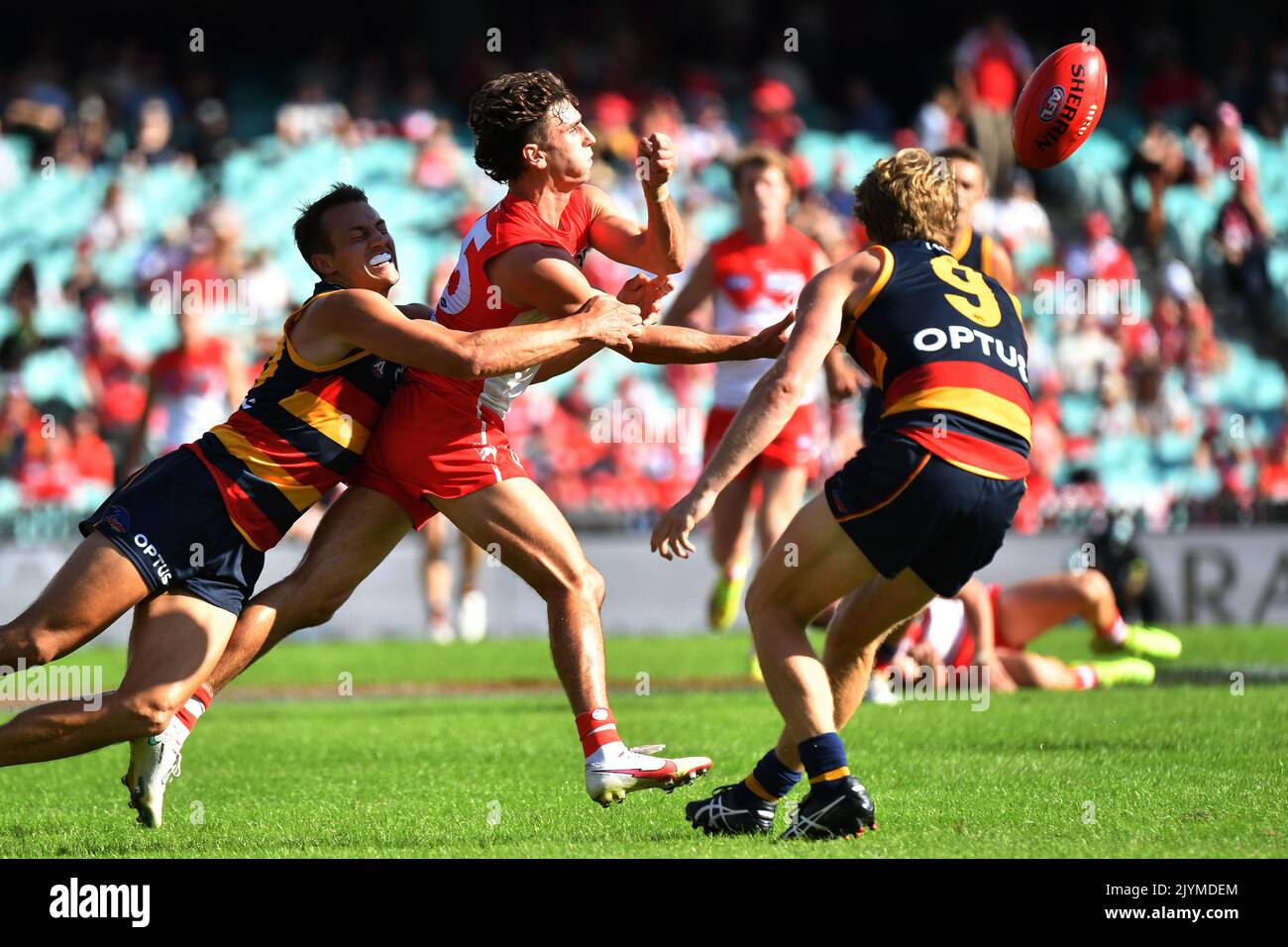 Tom McCartin of the Swans off loads the ball during the Round 2 AFL ...