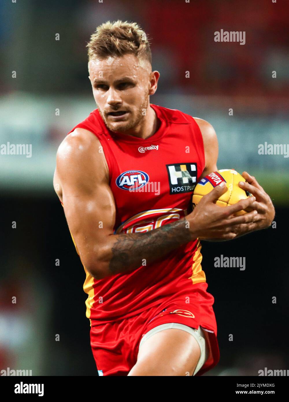 Brandon Ellis of the Suns in action during the Round 2 AFL match ...