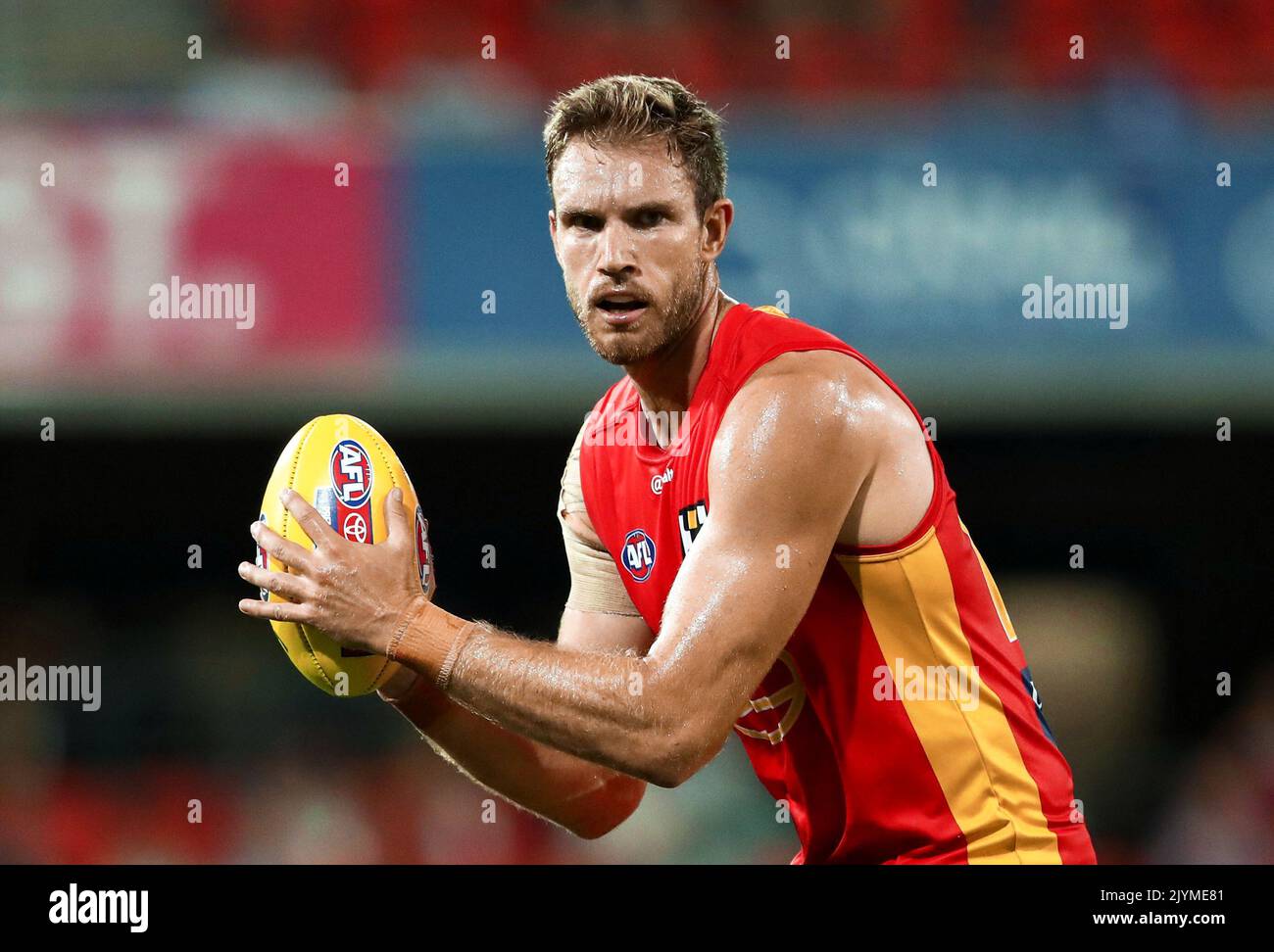 Sam Day of the Suns in action during the Round 2 AFL match between the ...