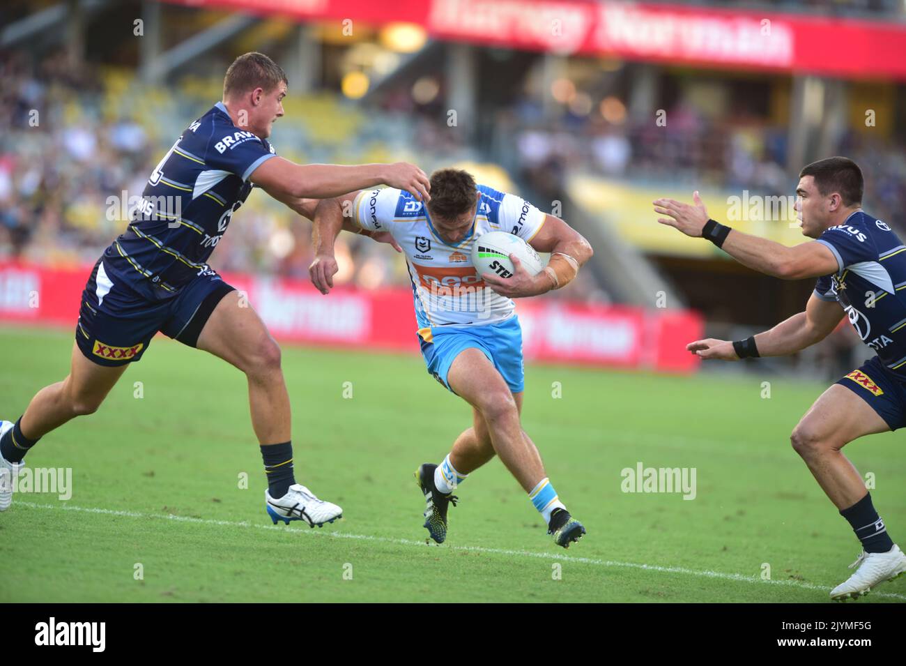 Mitch Rein breaks through the Cowboys line during the Round 3 NRL match ...