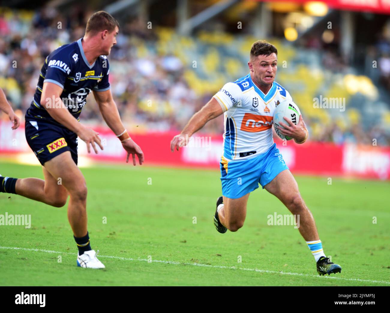 Mitch Rein breaks through the Cowboys line during the Round 3 NRL match ...
