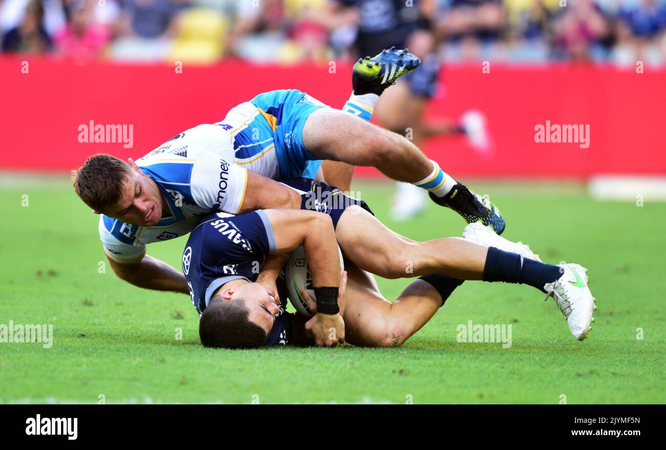Cowboys Jake Clifford tackled by Mitch Rein for Titans during the Round ...
