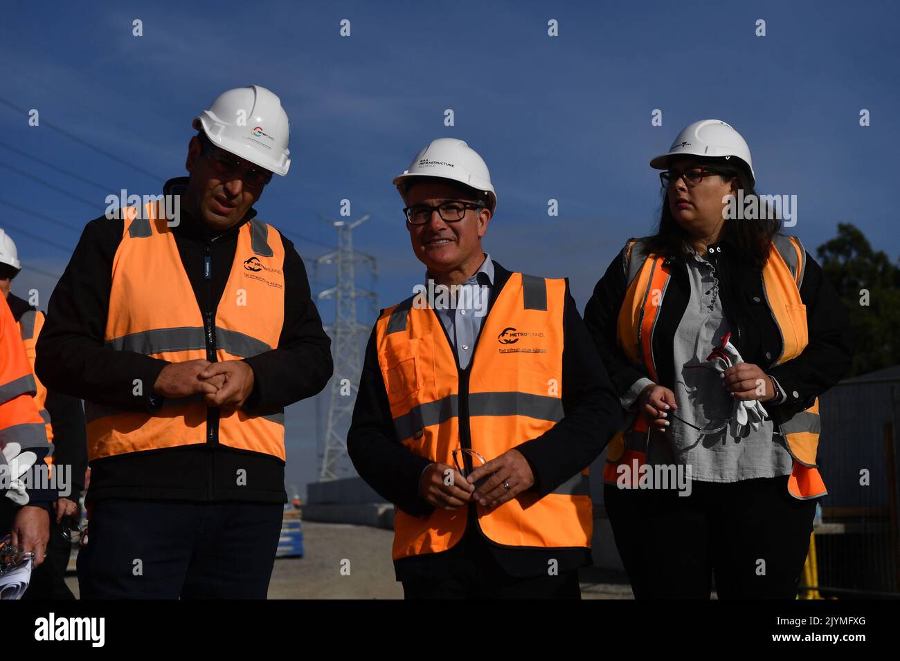 Acting Victorian Premier James Merlino (centre) tours a construction ...