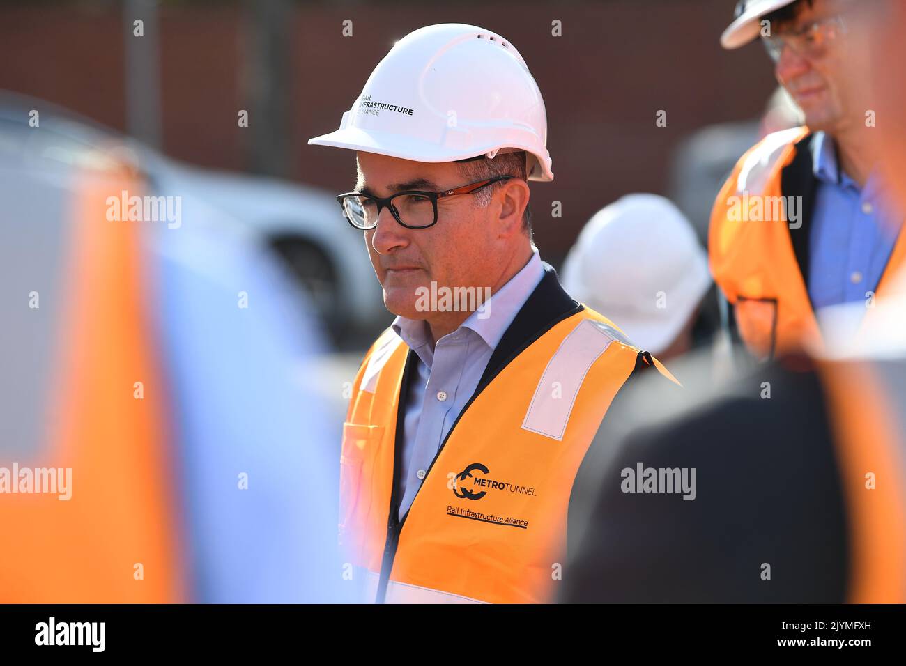 Acting Victorian Premier James Merlino (centre) tours a construction ...