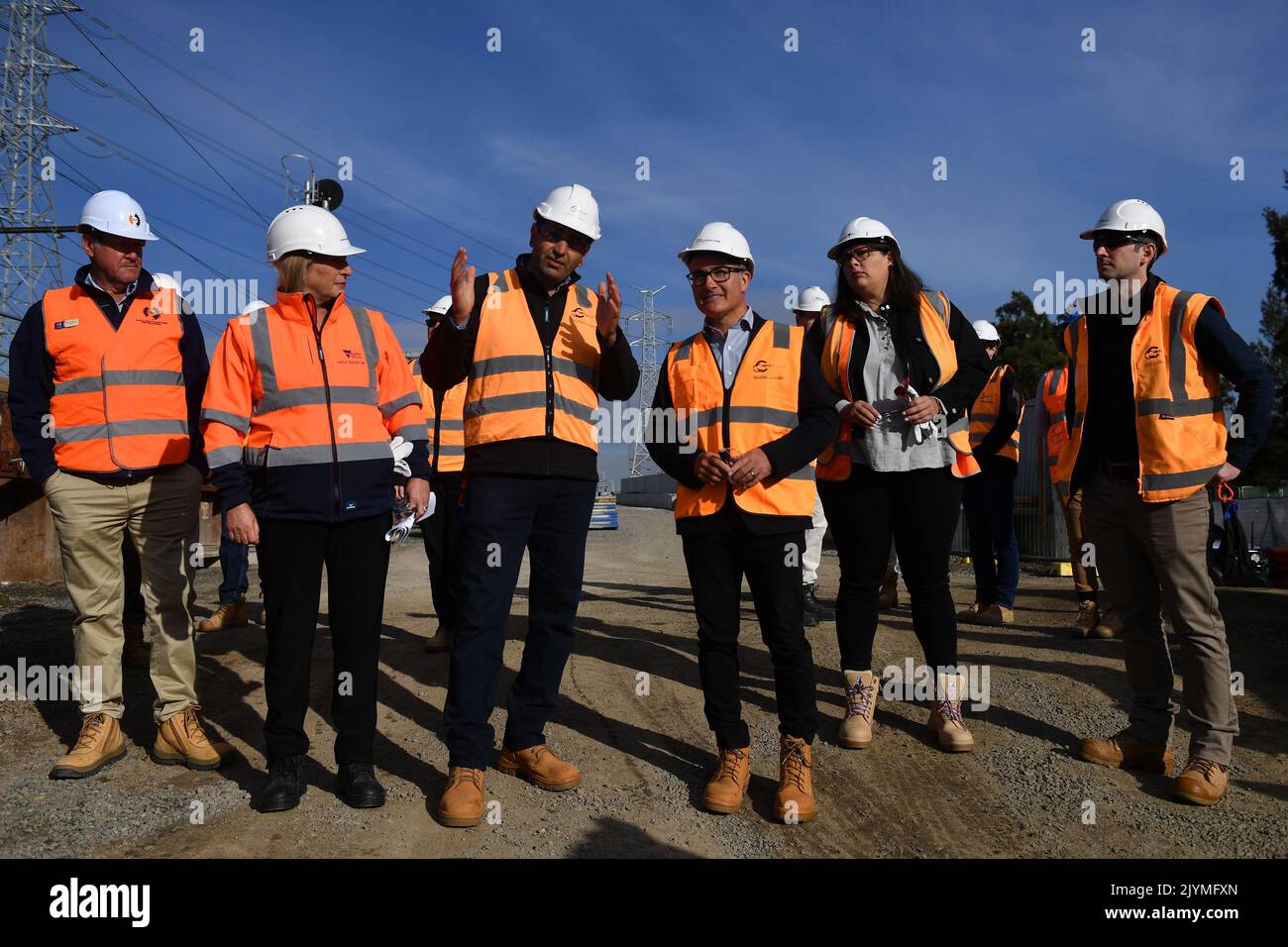 Acting Victorian Premier James Merlino (centre) tours a construction ...