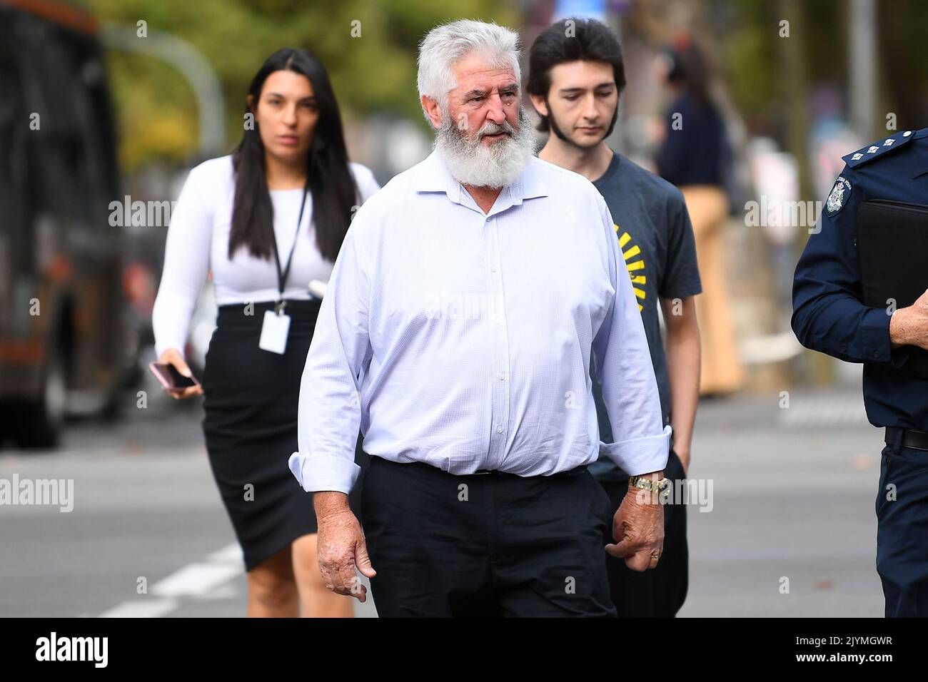 Partner of Senior Constable Lynette Taylor, Stuart Schultz (centre) arrives to the County Court ...