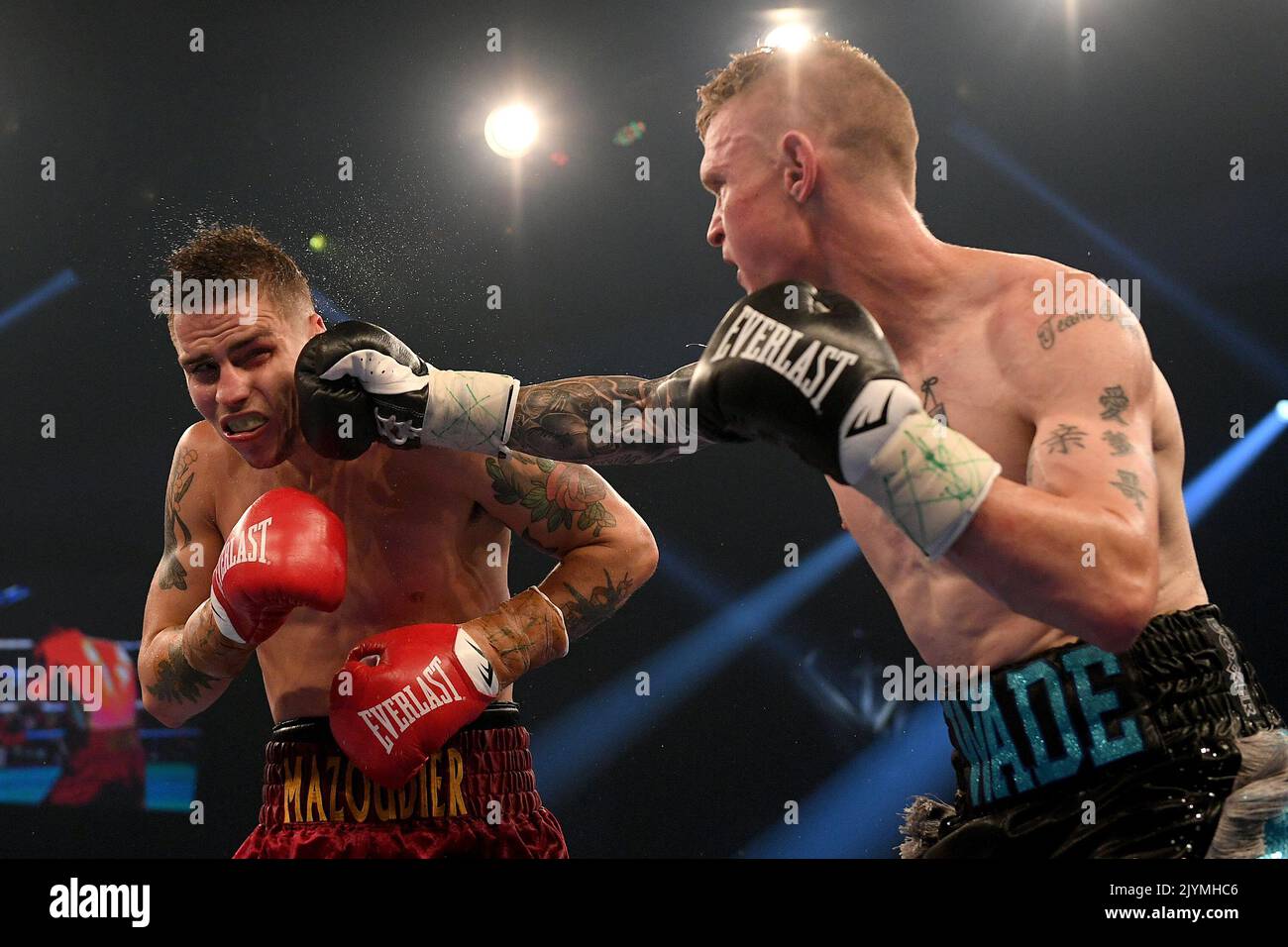 Wade Ryan (right) and Koen Mazoudier in their undercard bout during the ...