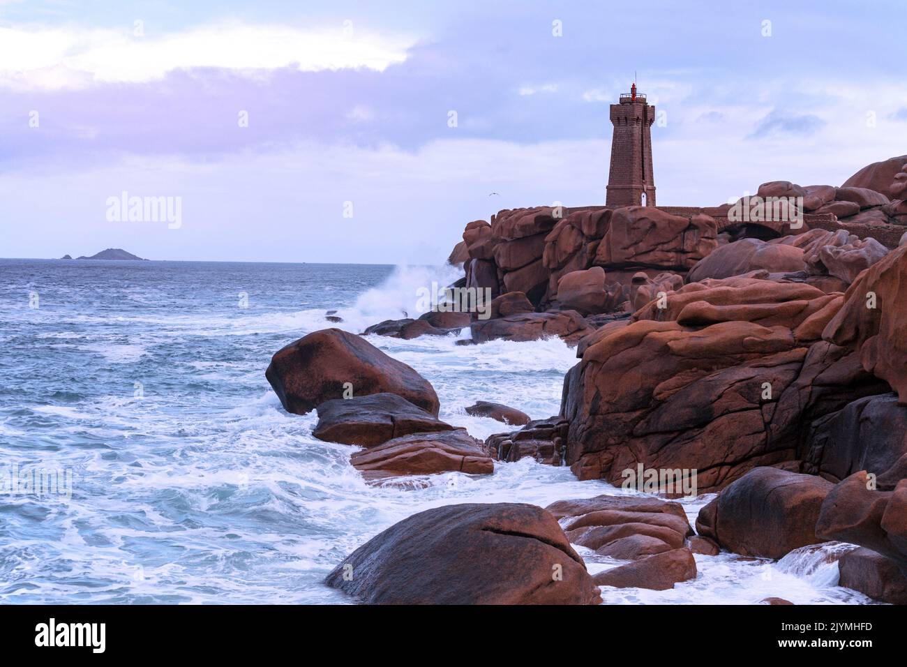 lighthouse Phare de Men Ruz and typical Brittany coast at the Tregastel ...