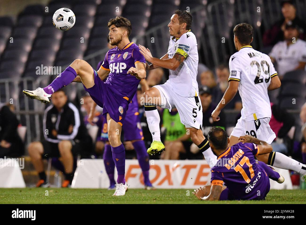 Brandon Wilson of the Glory and Mark Milligan of Macarthur during the A ...