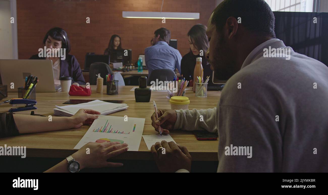 Employees working in night hi-res stock photography and images - Alamy