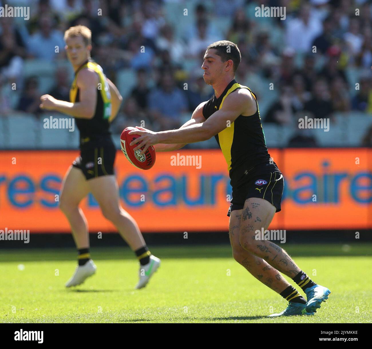 Jason Castagna of the Tigers kicks during the Round 3 AFL match between ...