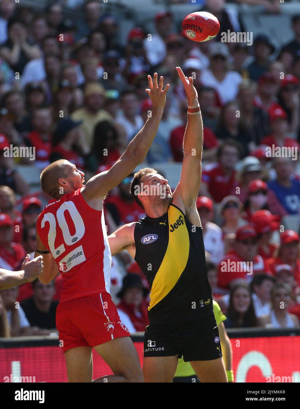 Sam Reid of the Swans (left) contests ruck against Toby Nankervis of ...