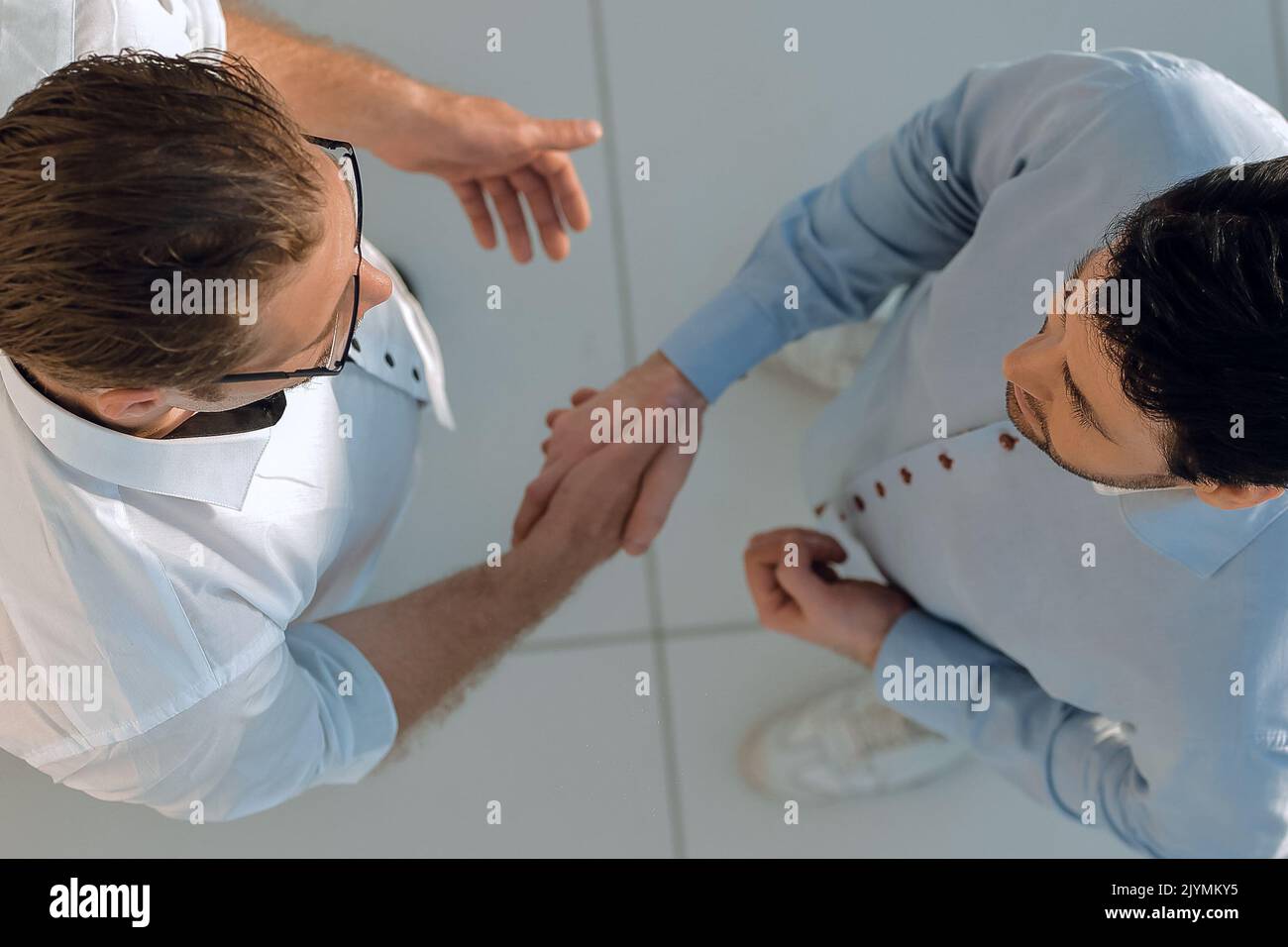 top view. handshake of modern business people Stock Photo - Alamy