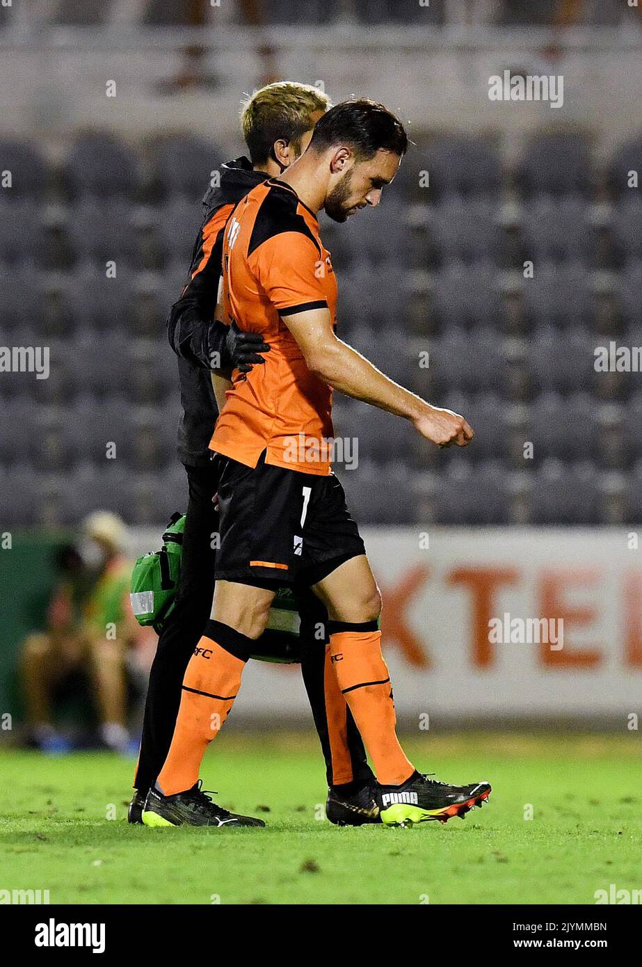 Jack Hingert of the Roar is taken off the field due to an injury during ...