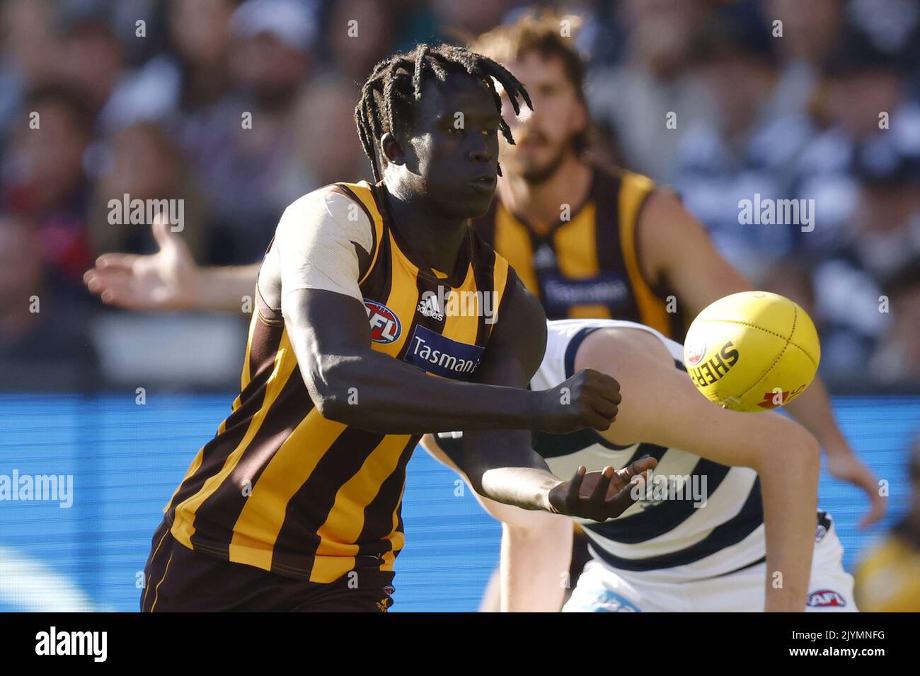 Changkuoth Jiath of the Hawks ah during the Round 3 AFL match between ...