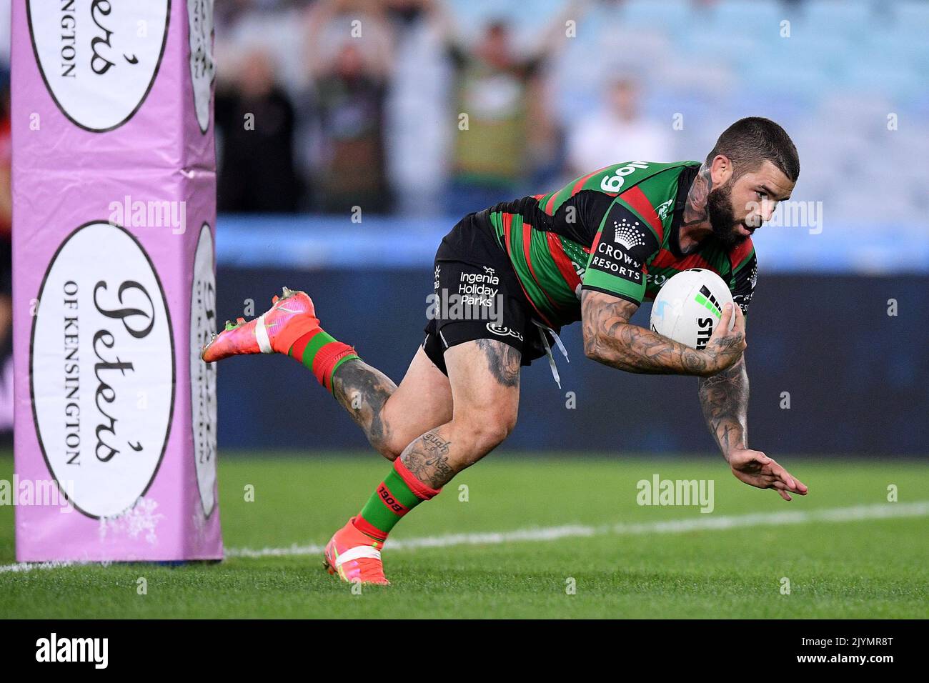 Adam Reynolds of the Rabbitohs scores a try during the Round 4 NRL ...