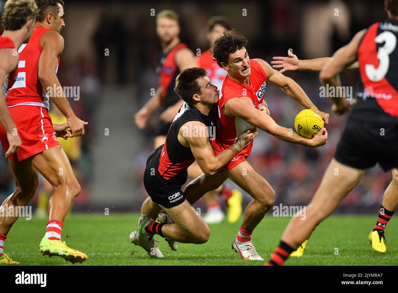 Sam Wicks of the Swans hand balls during the Round 4 AFL match between ...