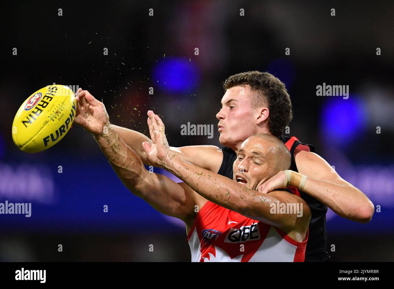Sam Reid of the Swans and Nik Cox of the Bombers during the Round 4 AFL ...