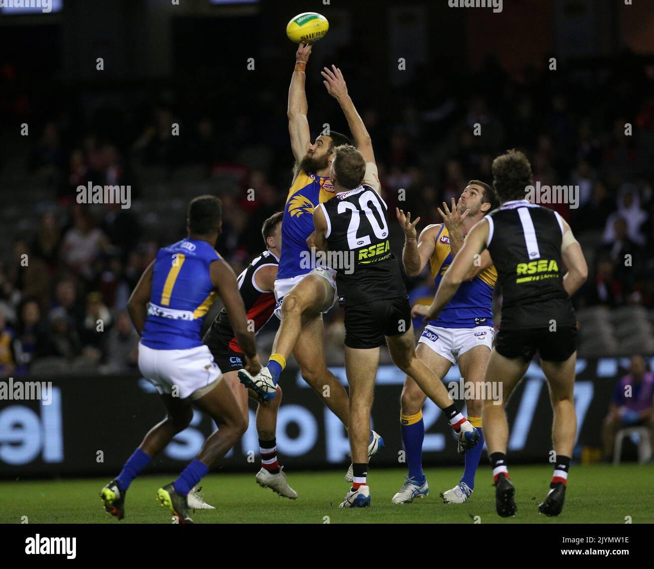Josh Kennedy of the Eagles contests with Dougal Howard of the Saints ...