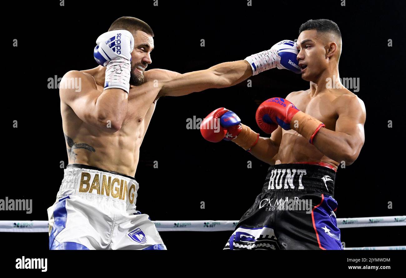 Ben Kite (left) lands a punch on Andrew Hunt (right) during their ...