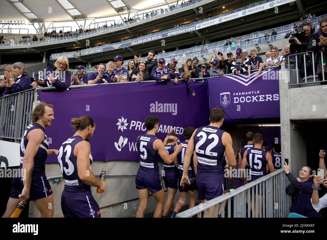 Dockers players leave the field after their win during the Round 4 AFL ...