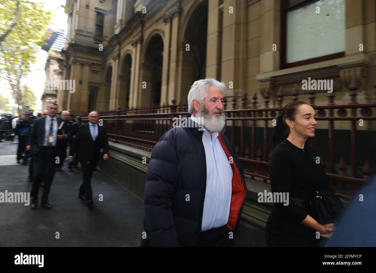 Husband of Senior Constable Lynette Taylor, Stuart Schultz, walks next ...