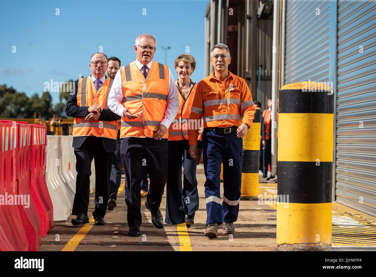 Prime Minister Scott Morrison talks with Mike Henry, (right) CEO of BHP ...