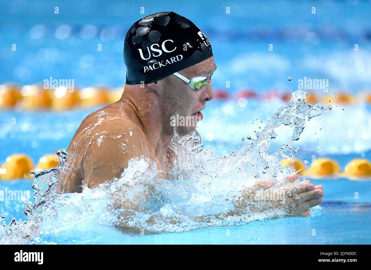 Jake Packard swims during a 50m Breaststroke heat during Day 2 of the ...