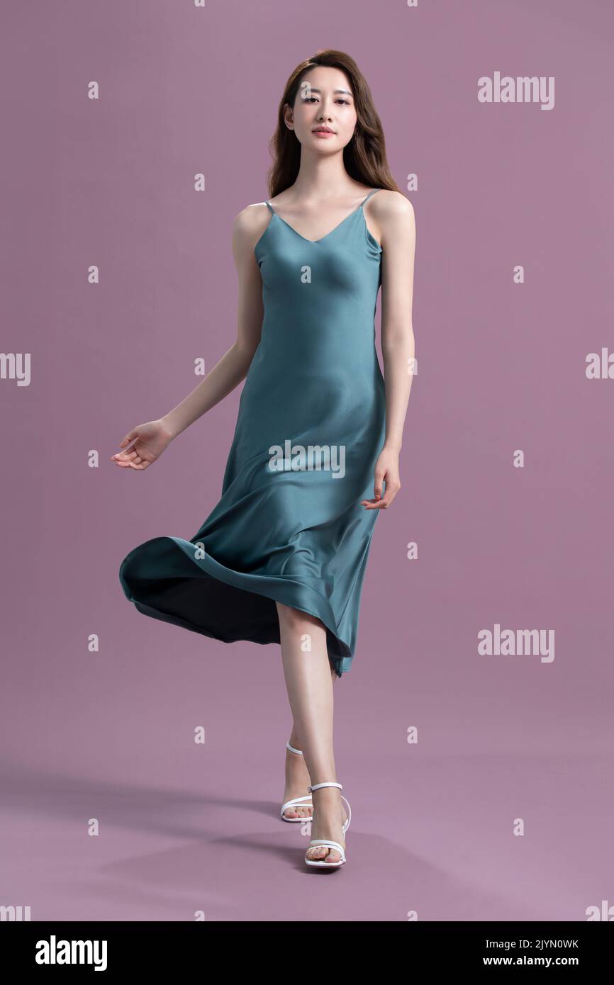 Young slim women purple hi-res stock photography and images - Alamy