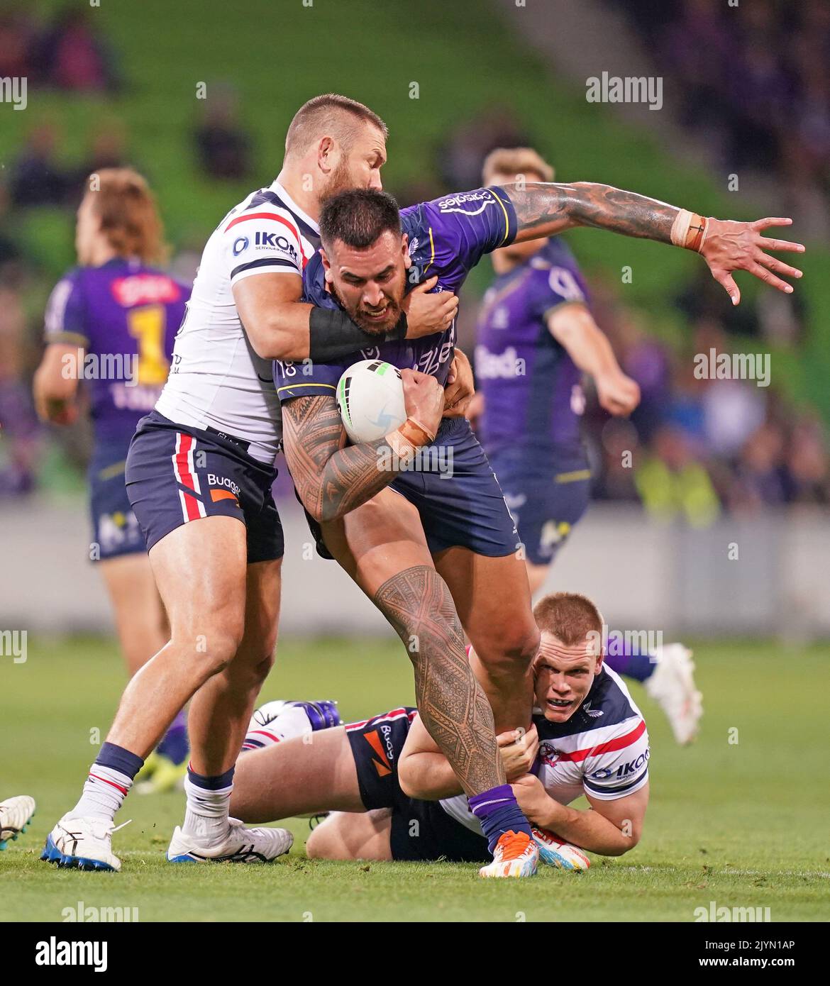 Nelson Asofa-Solomona of the Melbourne Storm is tackled during the ...