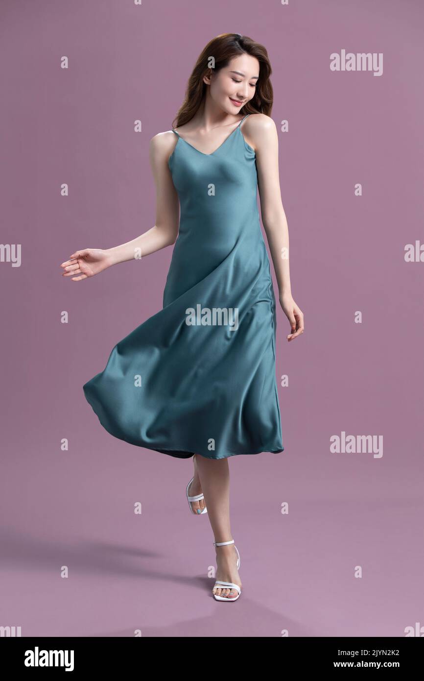 Young slim women purple hi-res stock photography and images - Alamy