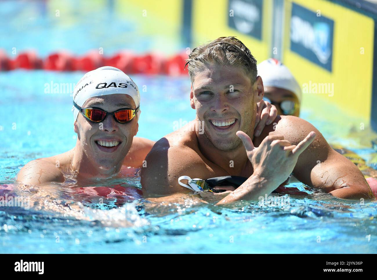 Zac Stubblety-Cook (left) reacts with Jake Packard after swimming in ...